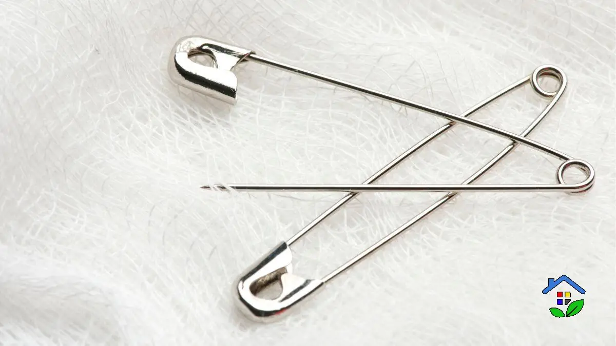 What’s the Purpose of the Hole in a Safety Pin’s Coil?